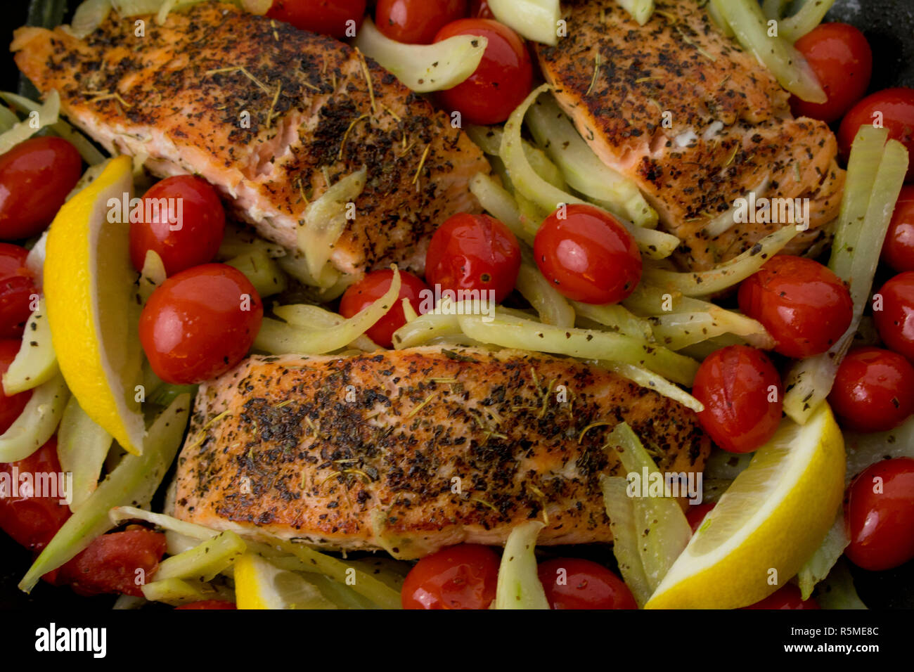 Slices fried fish tomatoes hi-res stock photography and images - Alamy