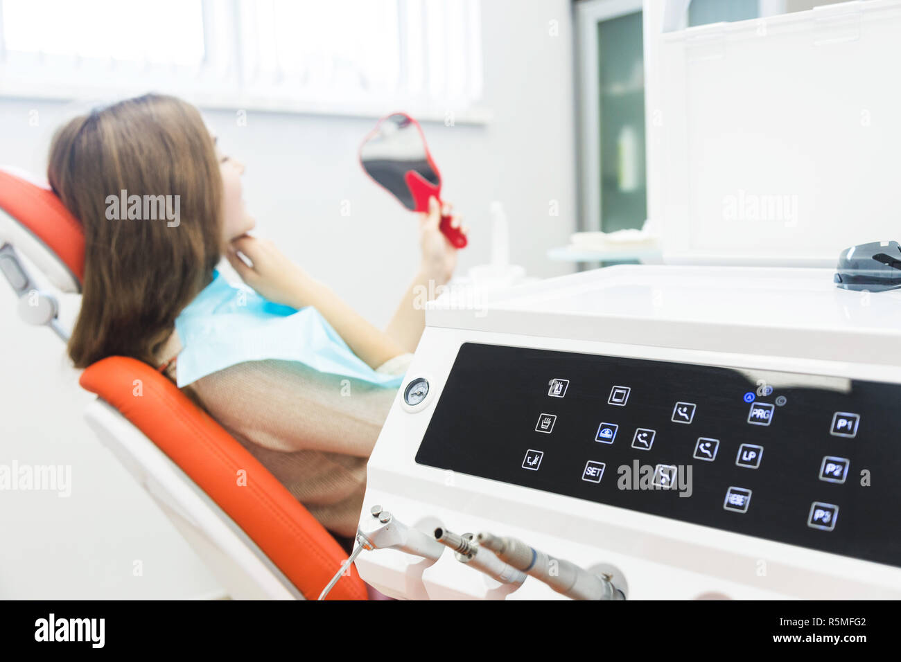 Dental clinic. Reception, examination of the patient. Teeth care. Young ...