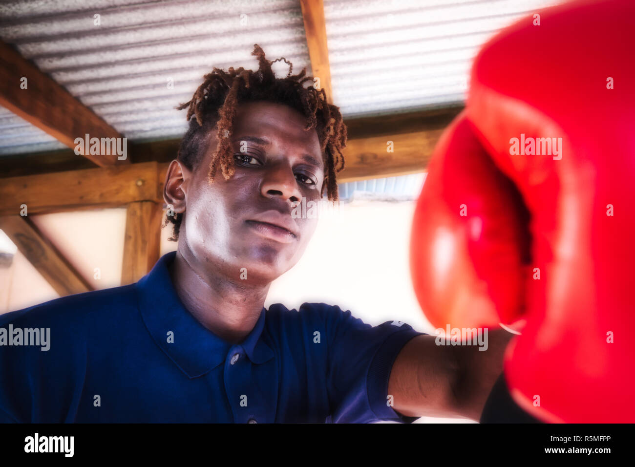 Young black man boxing Stock Photo - Alamy