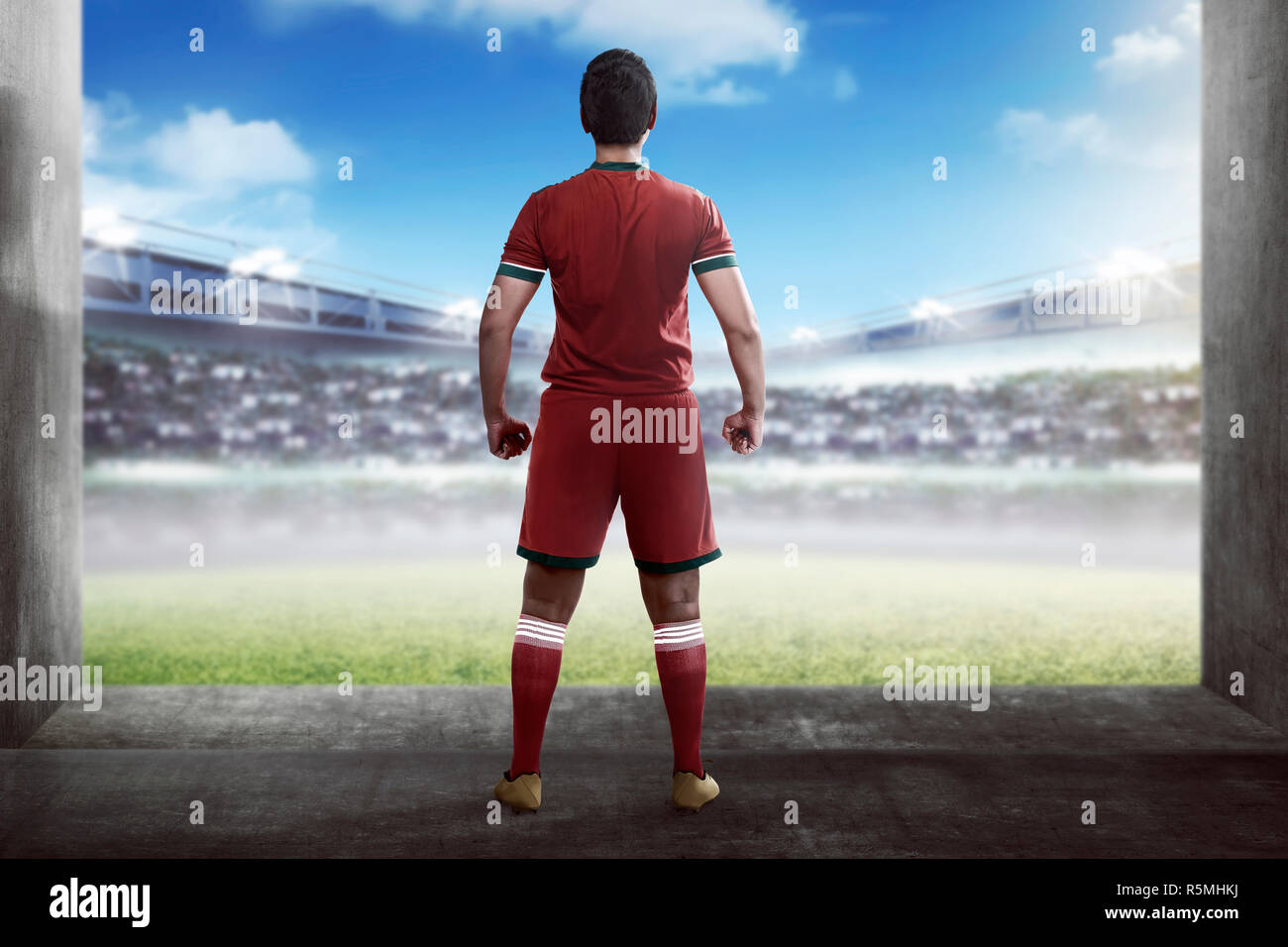 Back view of asian football player standing Stock Photo - Alamy