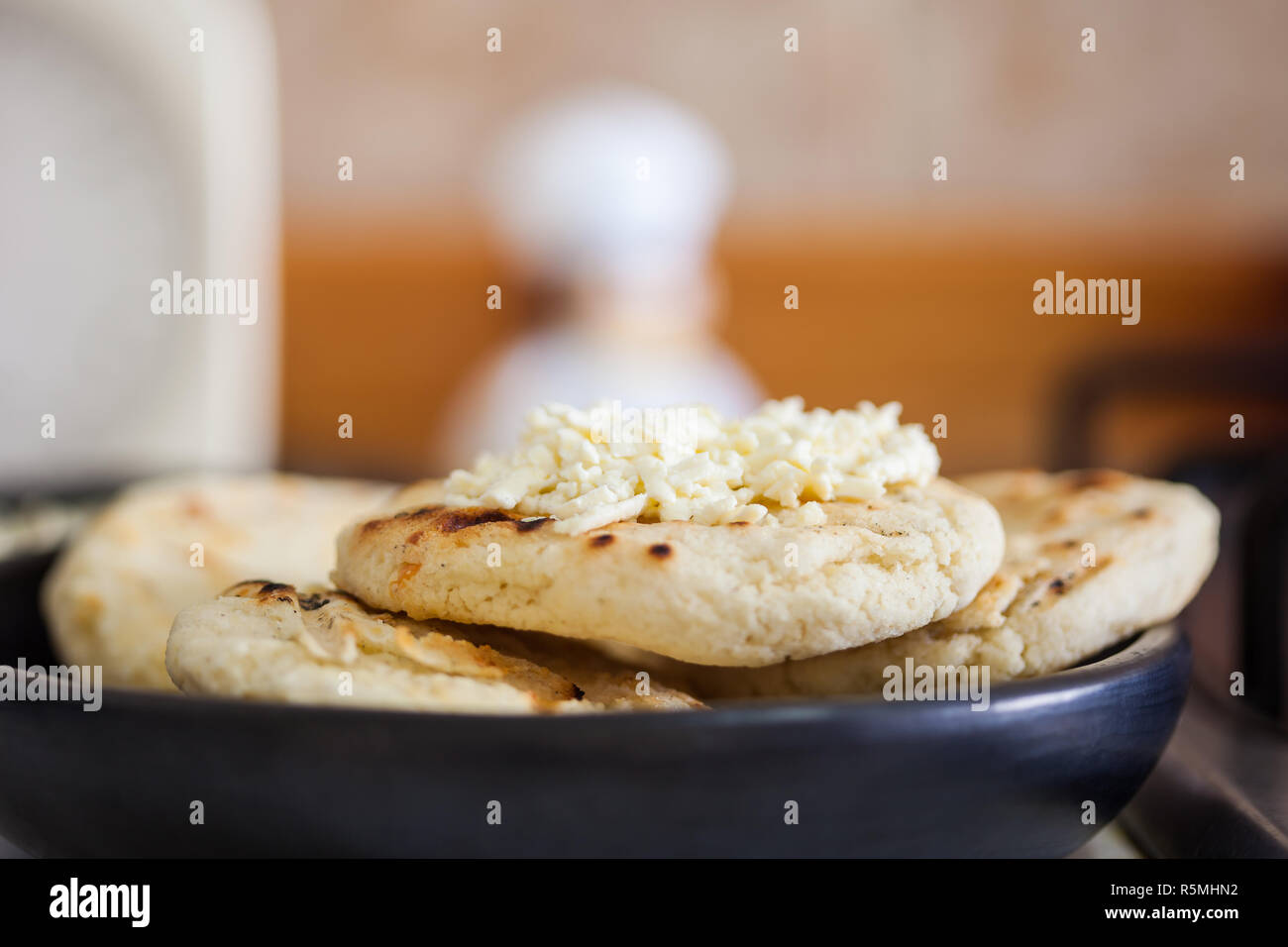 Traditional Colombian white corn arepa with cheese Stock Photo - Alamy