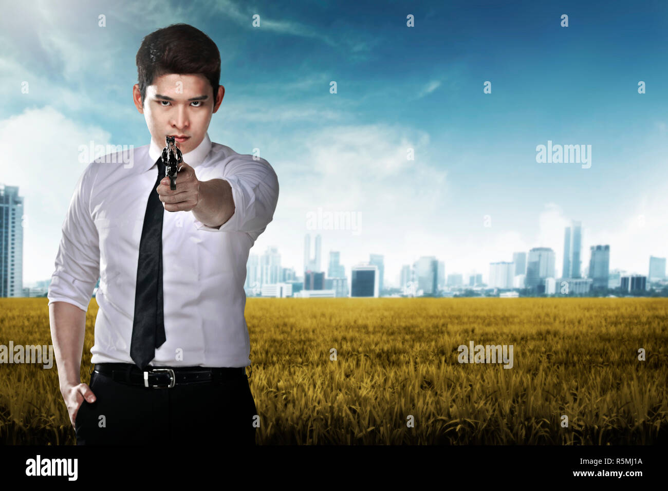 Serious Man Holding Pistol Pointing High Resolution Stock Photography ...