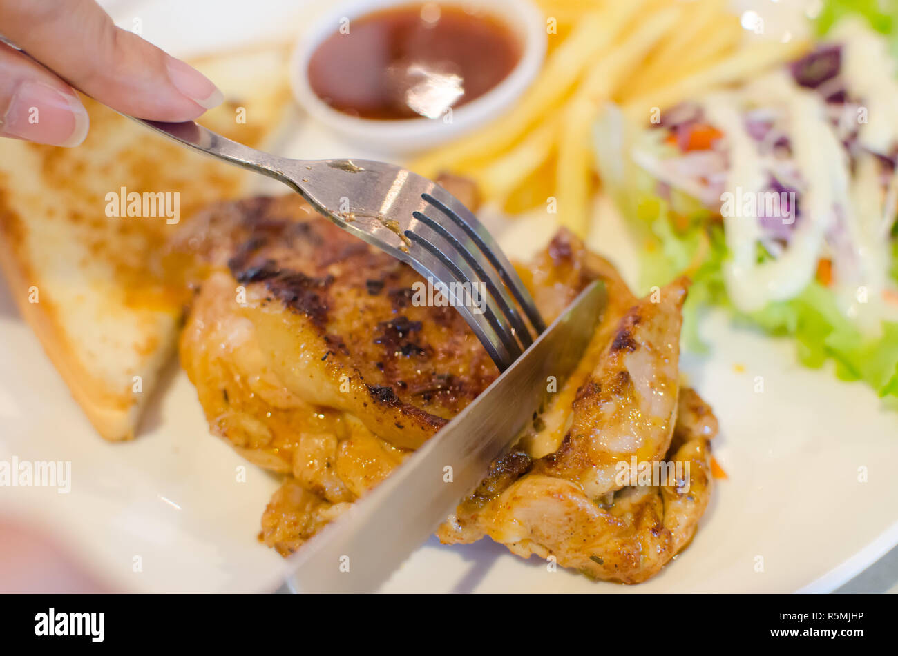 Herb chicken steaks hi-res stock photography and images - Alamy