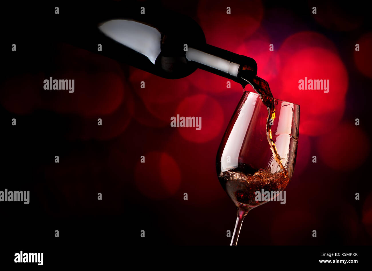 Wineglass on a vinous background Stock Photo - Alamy