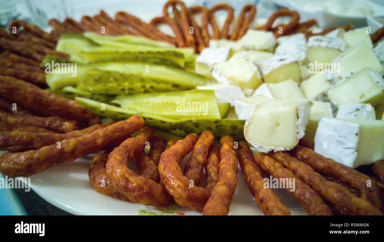 Big platter of sliced pickles, hermelin cheese and kabanos - sausage ...