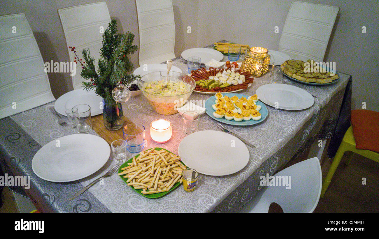 Traditional New Years feast. Decorated table with different kinds of ...
