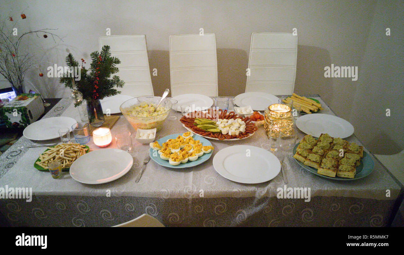 Traditional New Years feast. Decorated table with different kinds of ...