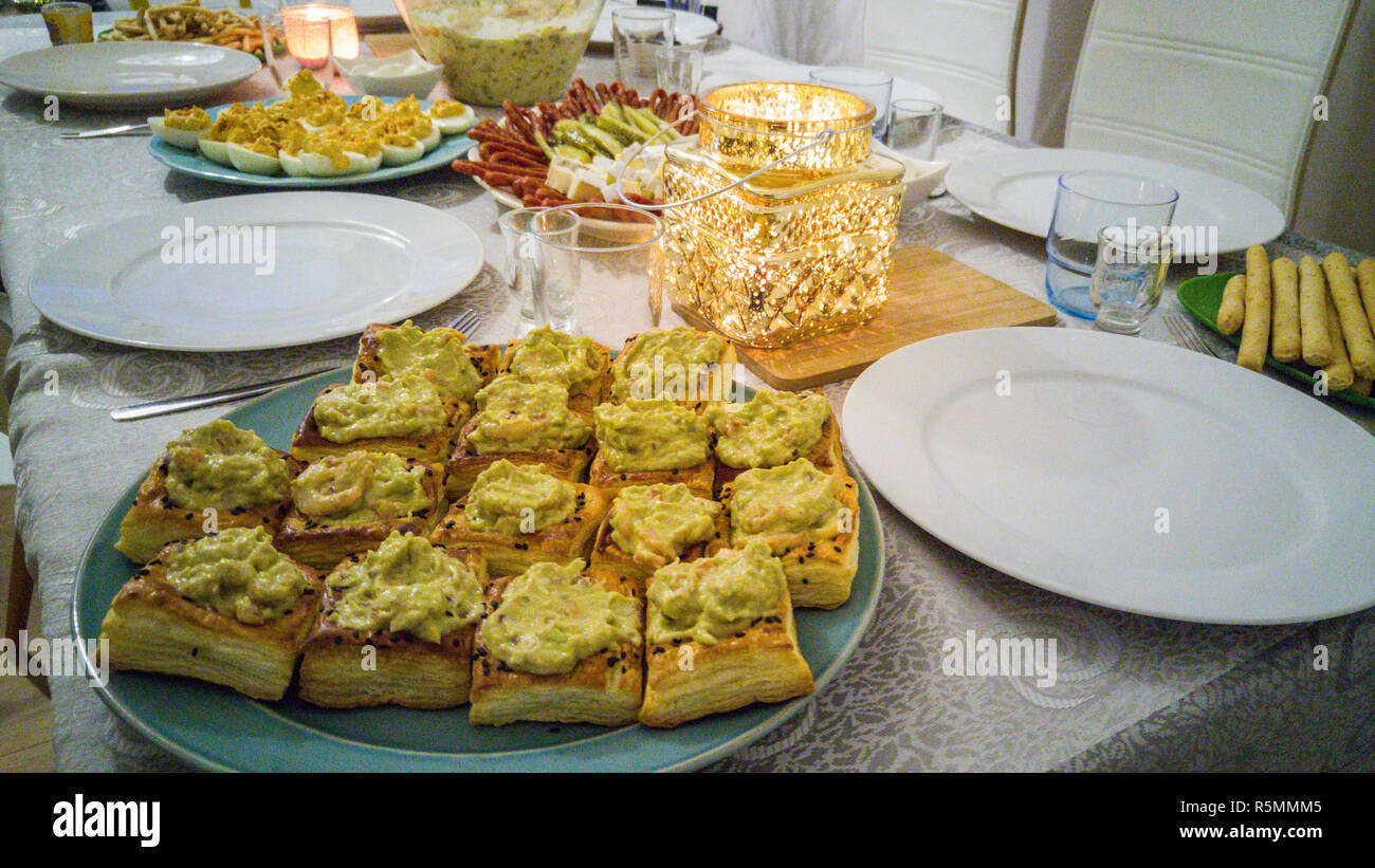 Traditional New Years feast. Decorated table with different kinds of ...