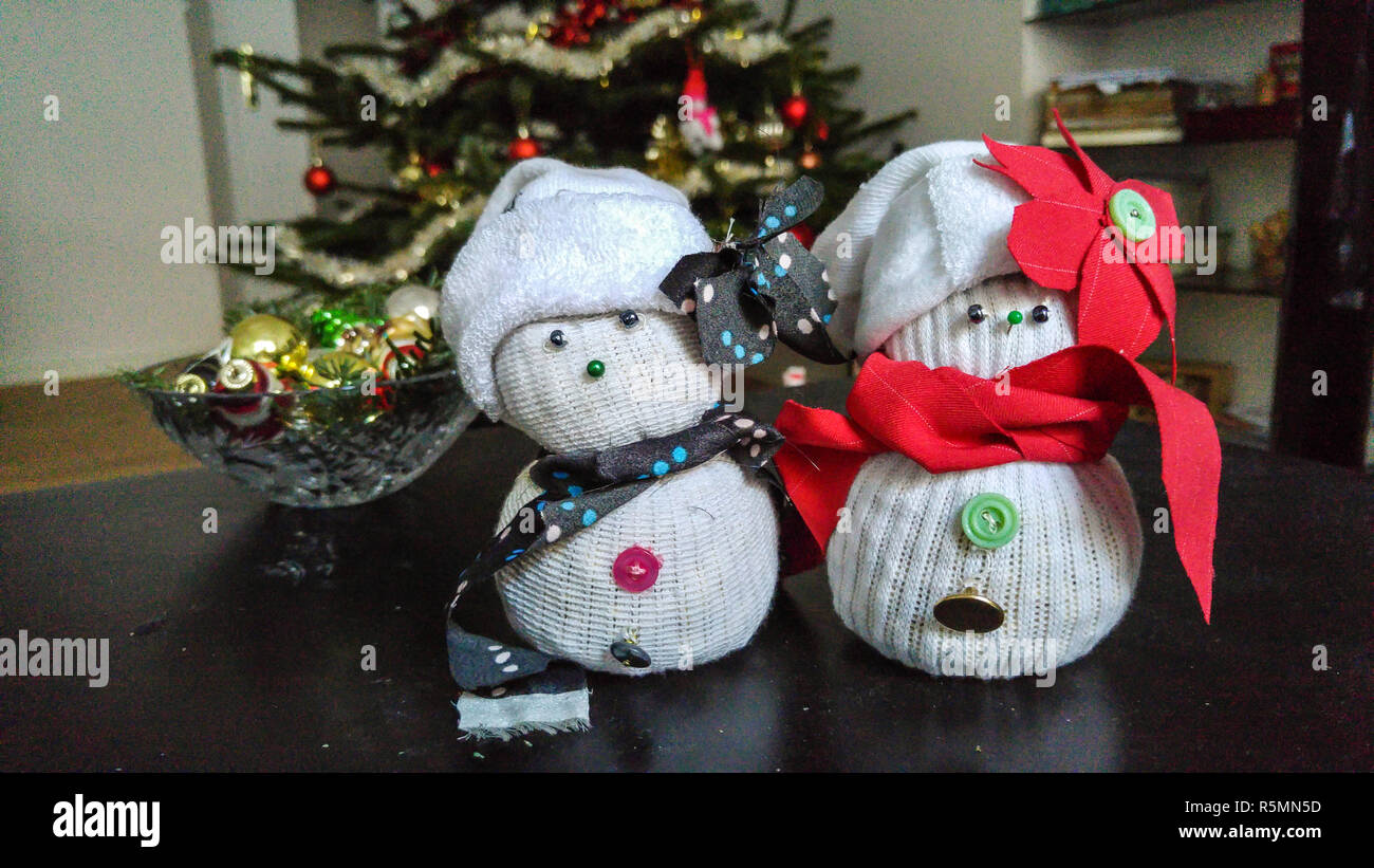 Two handmade snowman. Cute Christmas deocation made from white socks ...
