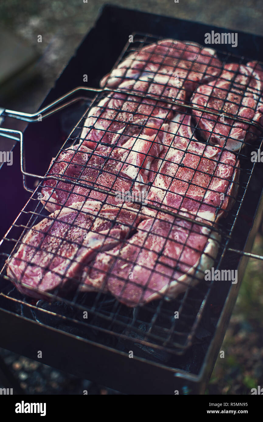 Grilling fresh entrecote pork Stock Photo - Alamy