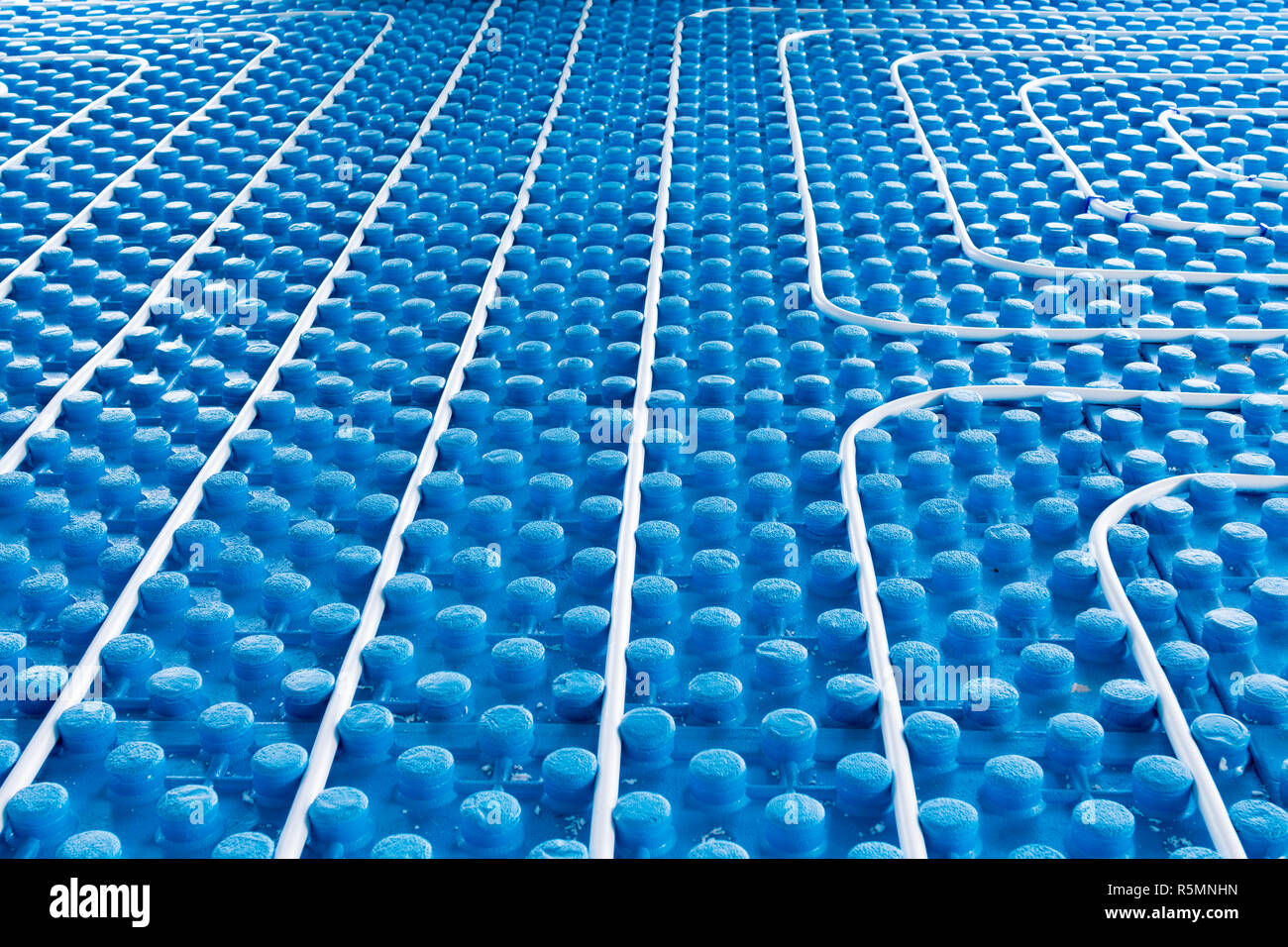 System floor radiant with polyethylene pipes Stock Photo - Alamy