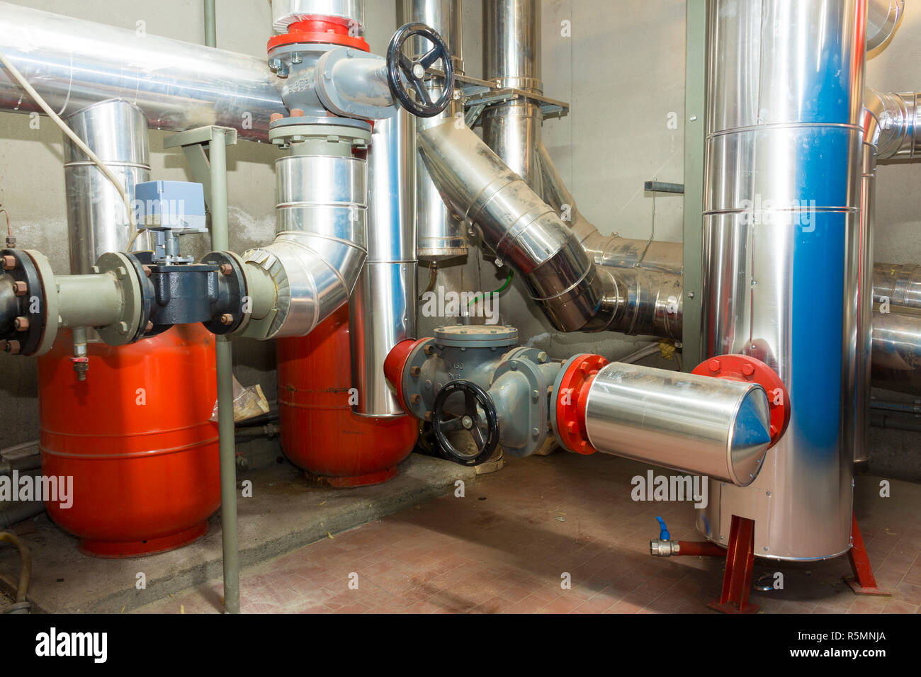Valves and plumbing pipes in the boiler room Stock Photo - Alamy