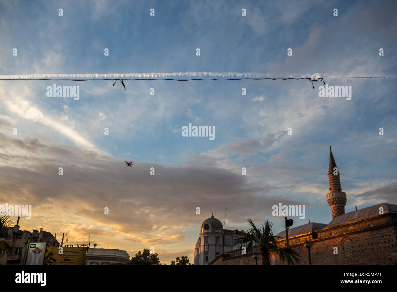 Three drones flying on a beautiful blue sky background Stock Photo - Alamy