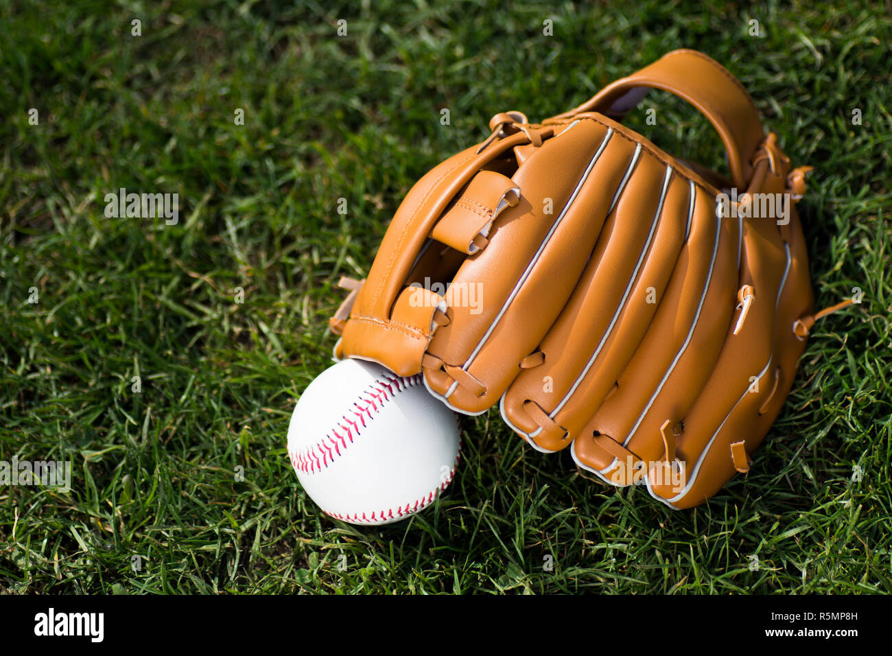 baseball glove and ball Stock Photo - Alamy