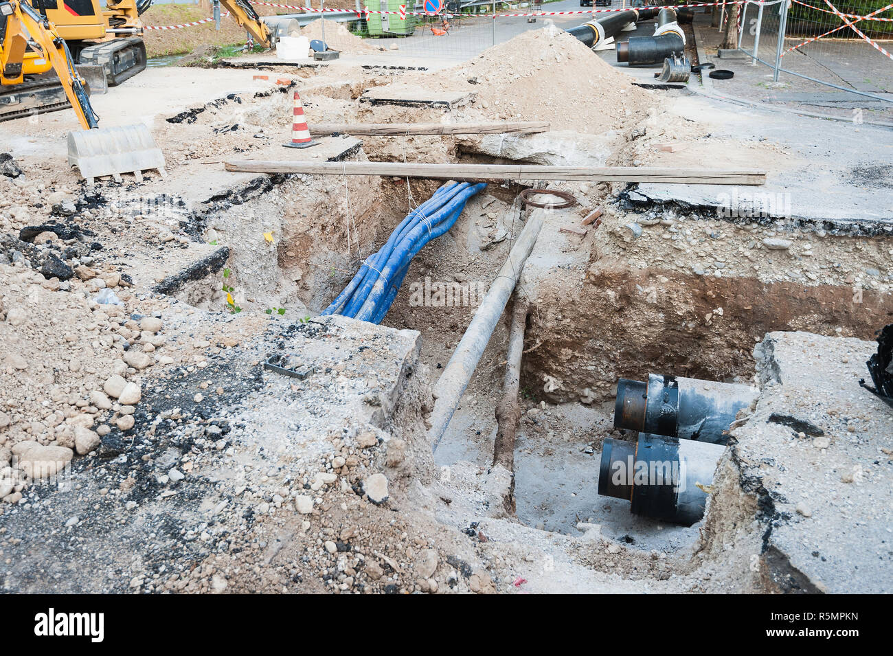 Installation of the pipes for district heating Stock Photo - Alamy