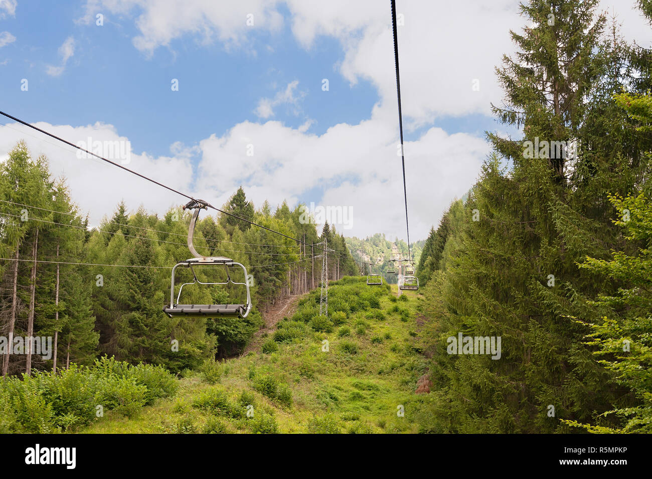Chairlift ski lift in European Alps Stock Photo - Alamy