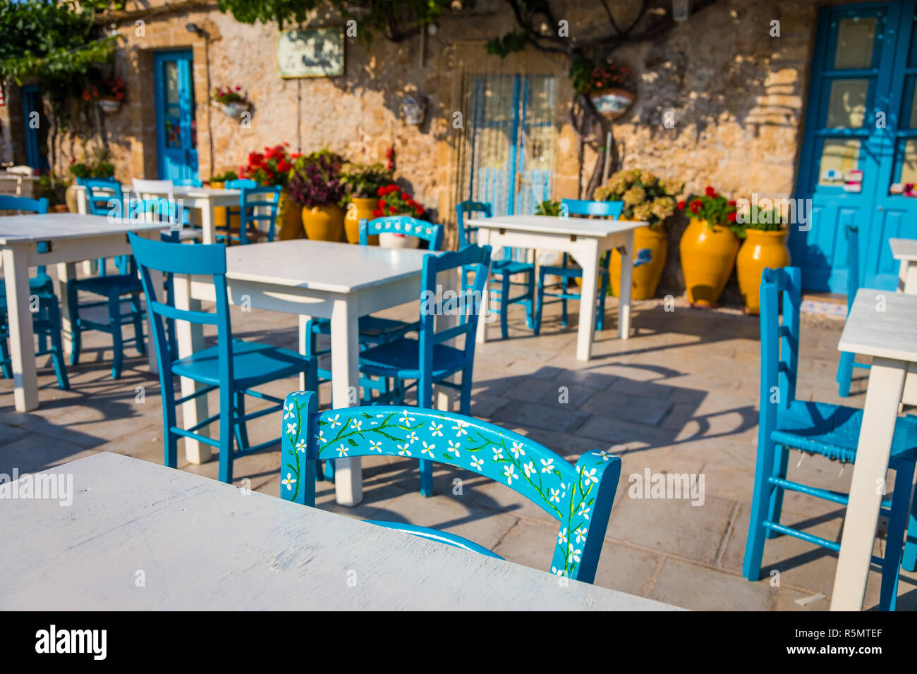 Tables in a traditional Italian Restaurant in Sicily Stock Photo - Alamy