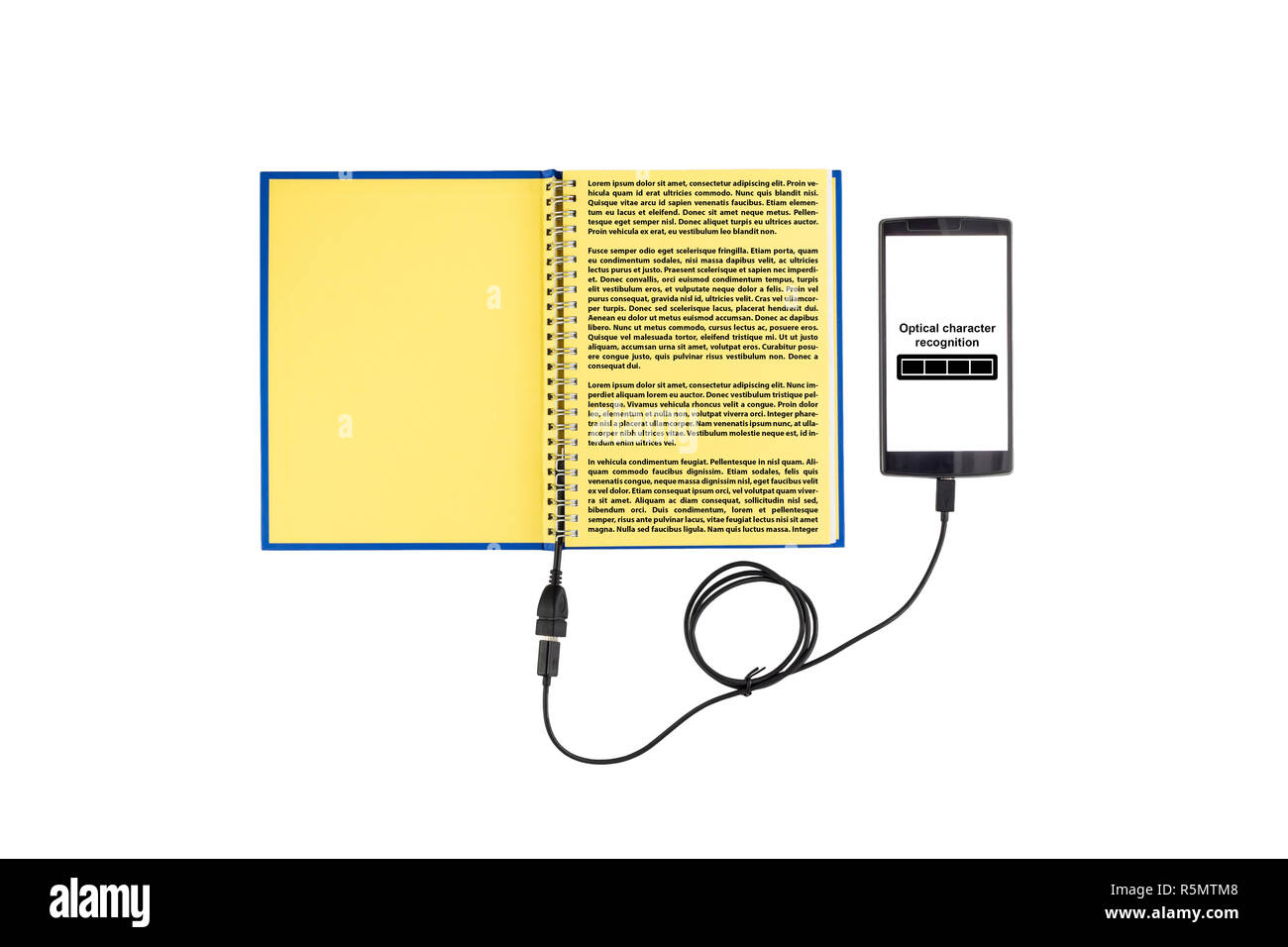 Notepad connected to a smartphone through an USB cable. Optical ...