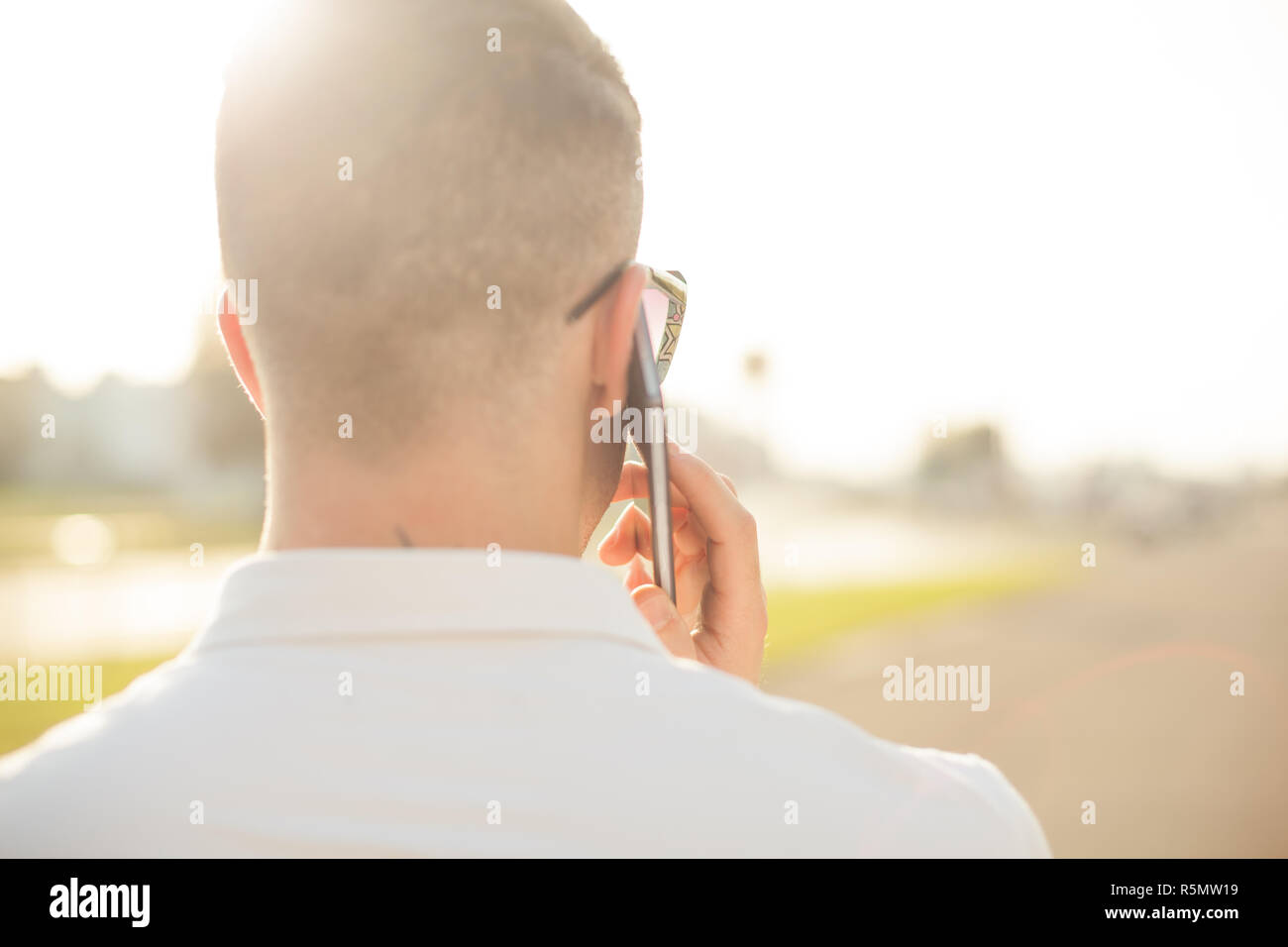 Back view man speak using hi-res stock photography and images - Alamy