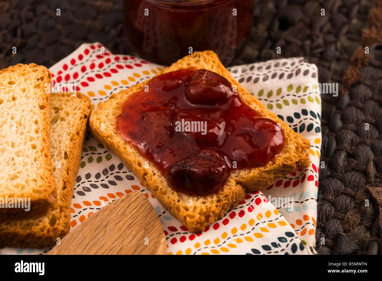 Breakfast of cherry jam on toast Stock Photo - Alamy