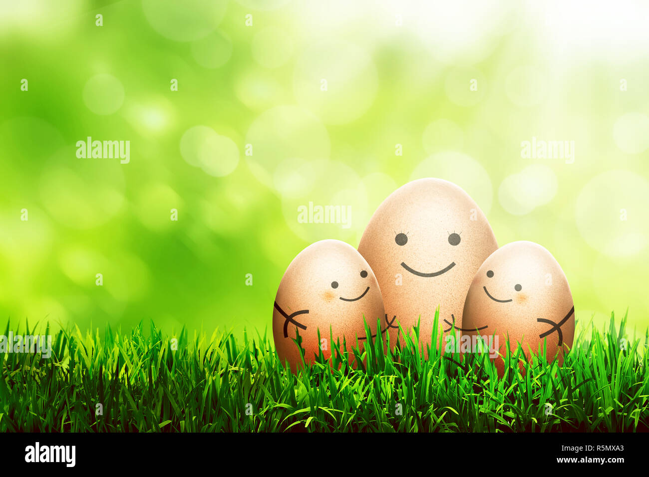 Three easter eggs with smile drawing Stock Photo - Alamy