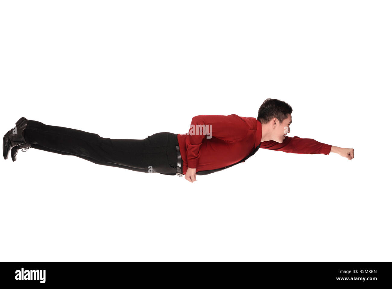 Business man flying posing Stock Photo - Alamy