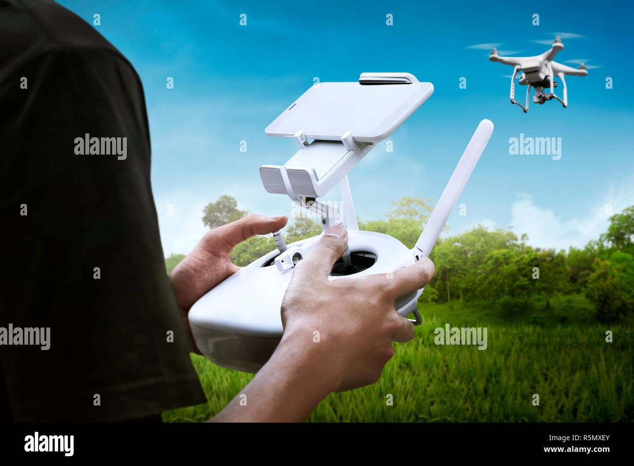 Man playing with drone Stock Photo - Alamy