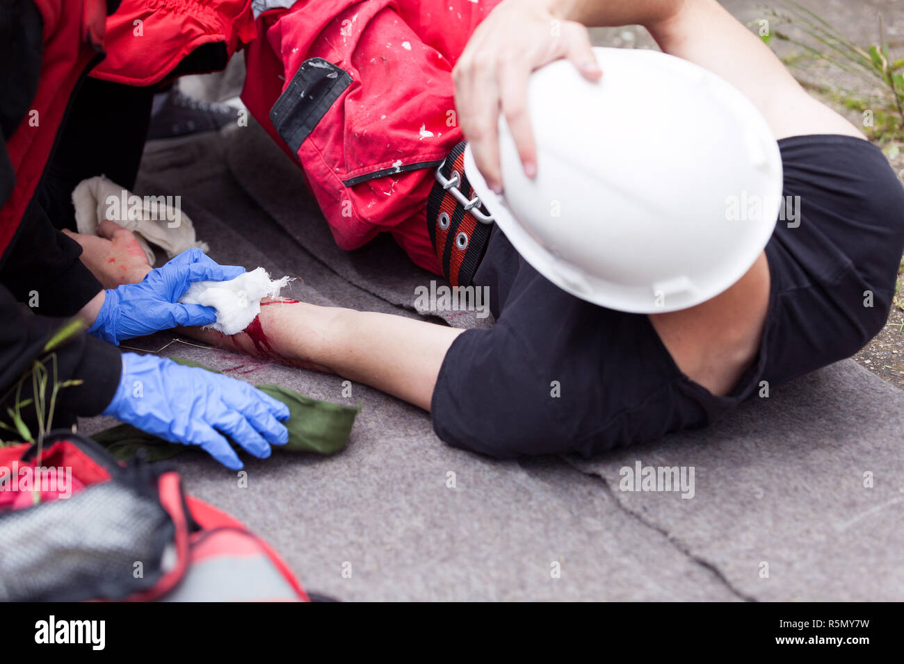 Work accident. First aid Stock Photo - Alamy