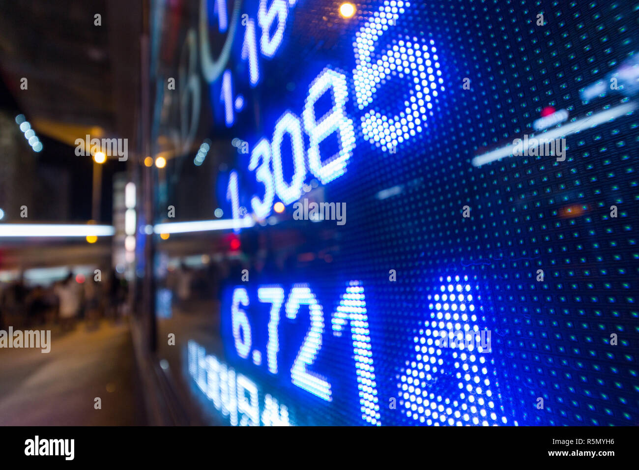 Stock market display screen at night Stock Photo - Alamy