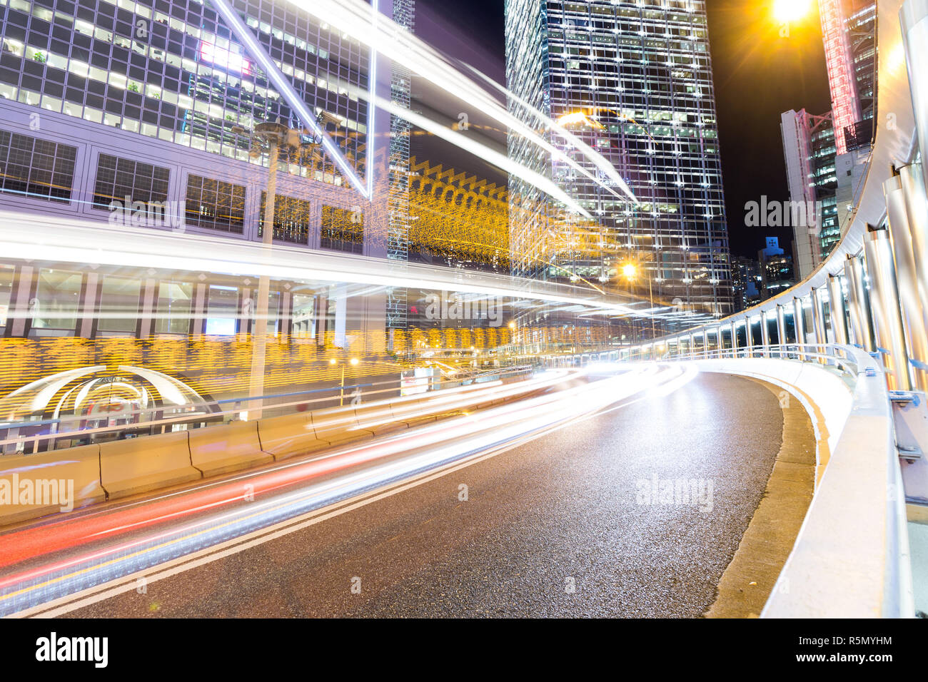 Hong Kong traffic trail at night Stock Photo - Alamy