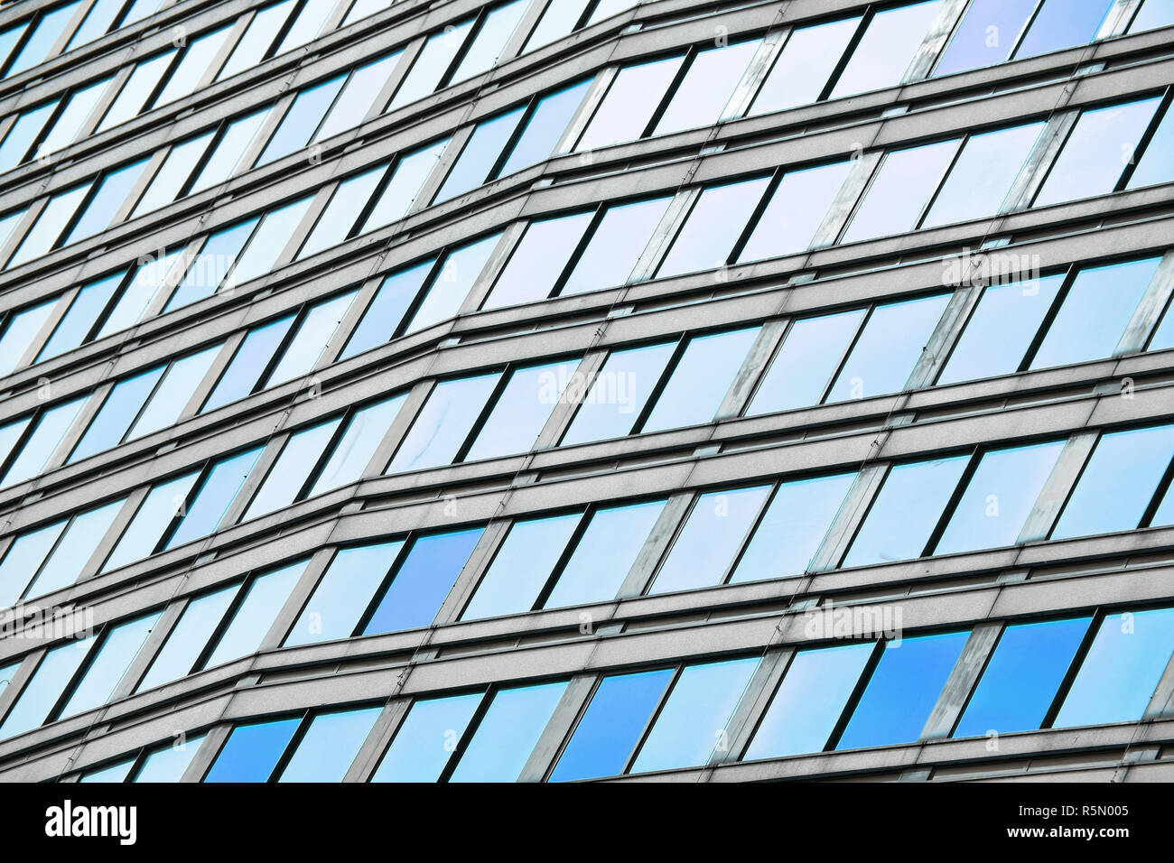 Modern business office building blue glass windows Stock Photo - Alamy