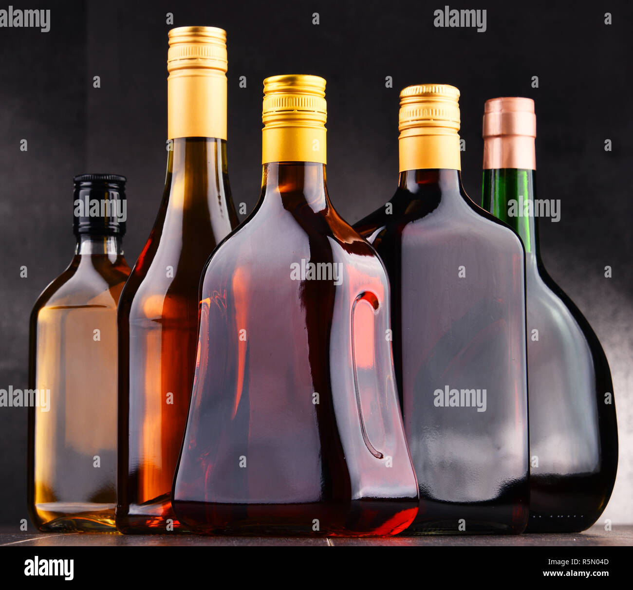 Bottles Of Assorted Alcoholic Beverages Stock Photos & Bottles Of ...