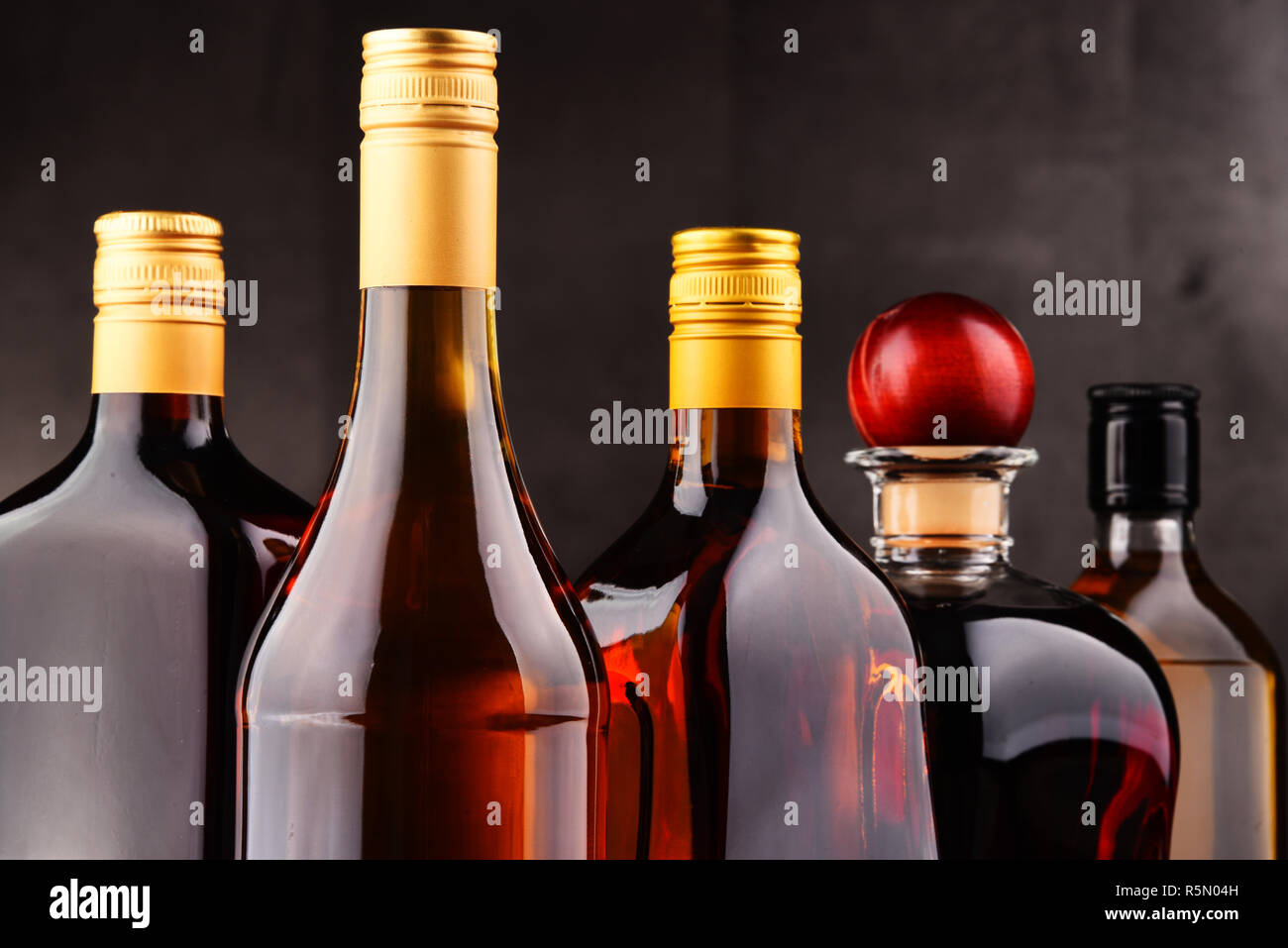 Bottles of assorted alcoholic beverages Stock Photo - Alamy