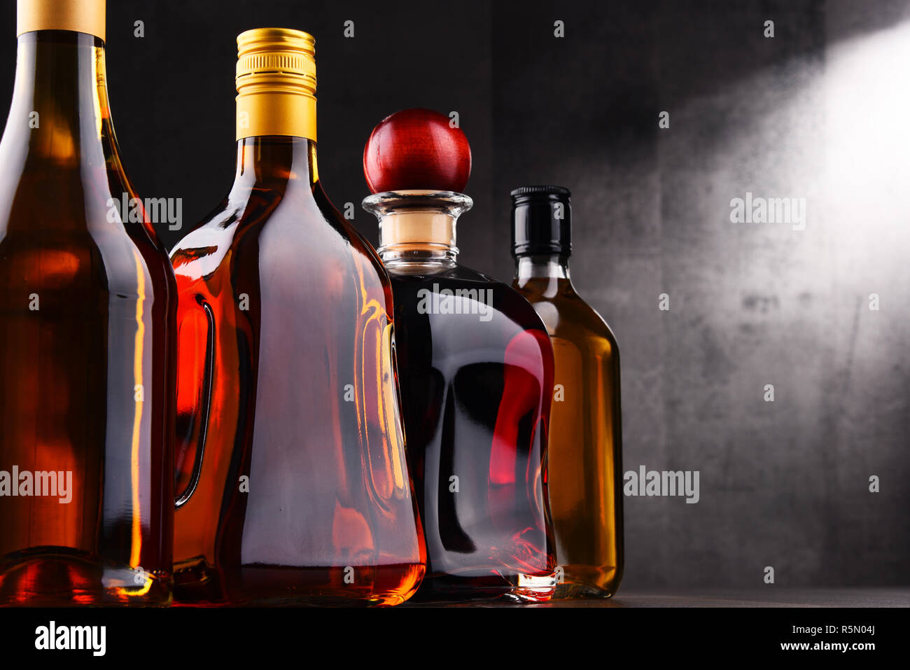 Bottles Of Assorted Alcoholic Beverages Stock Photos & Bottles Of ...