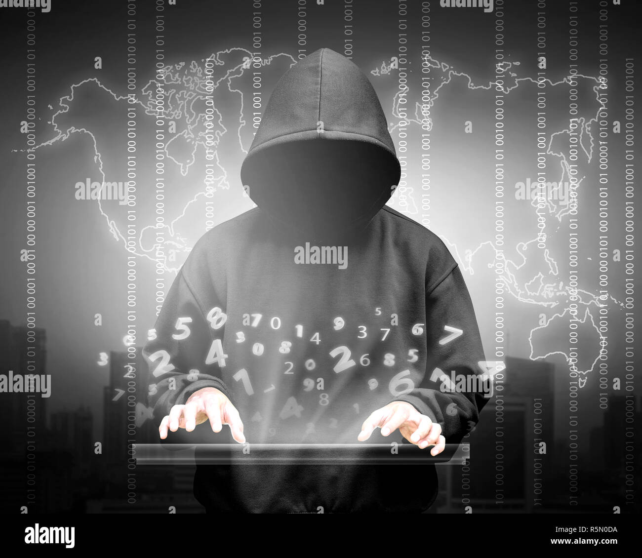 Computer hacker silhouette of hooded man Stock Photo - Alamy