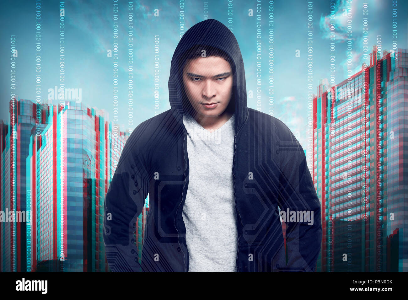 Hacker wearing hoodie shirt Stock Photo - Alamy