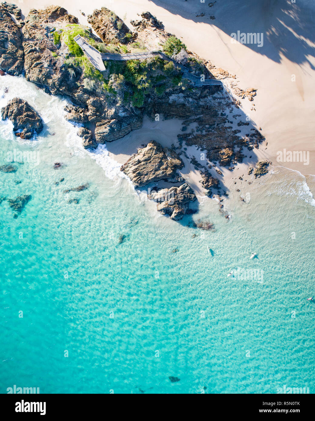 Aerial view above rock and the ocean. Beautiful blue turquoise water ...