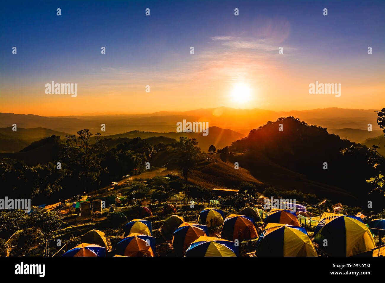 tent in the sunset overlooking mountains Stock Photo - Alamy