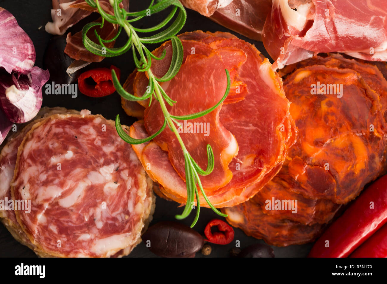 Pile different spanish embutido jamon hi-res stock photography and ...