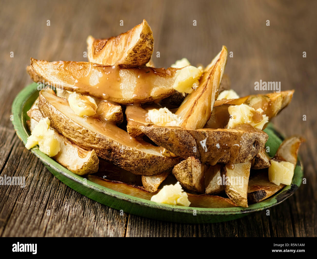 rustic canadian poutine Stock Photo - Alamy