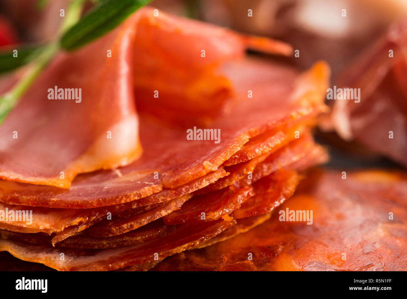a pile of different spanish embutido,jamon,chorizo u200bu200band lomo ...