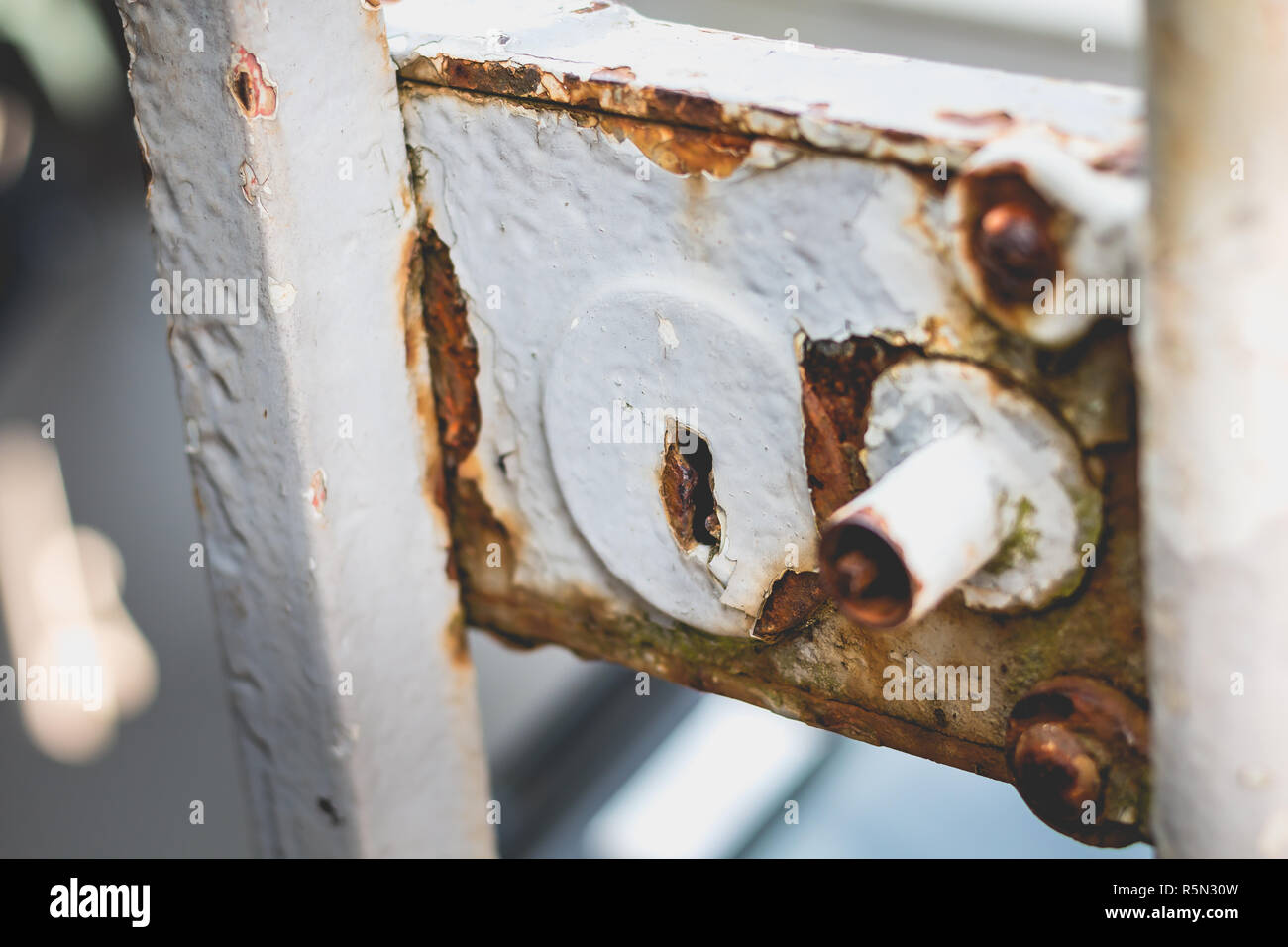 old rusty lock very damaged on a wrought iron gate Stock Photo - Alamy