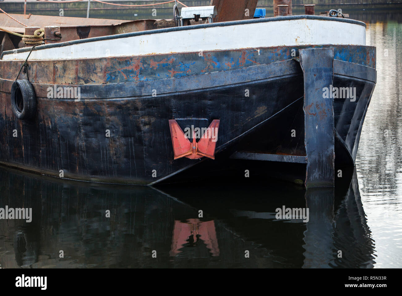 Barge with red anchor Stock Photo - Alamy