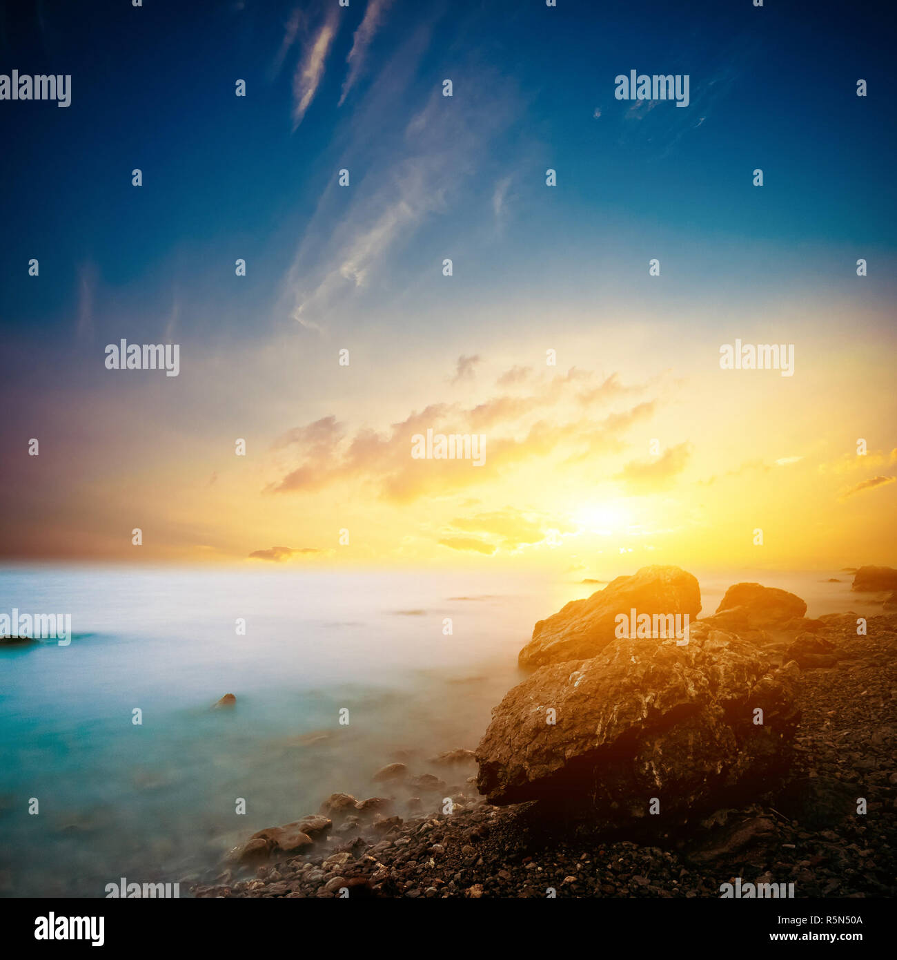 Evening ocean background Stock Photo - Alamy