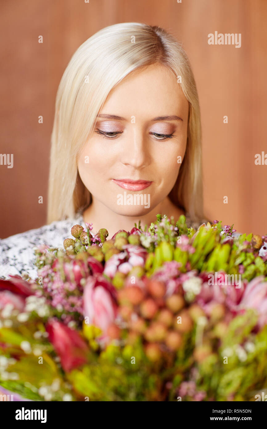 Delighted blonde woman taking hi-res stock photography and images - Alamy
