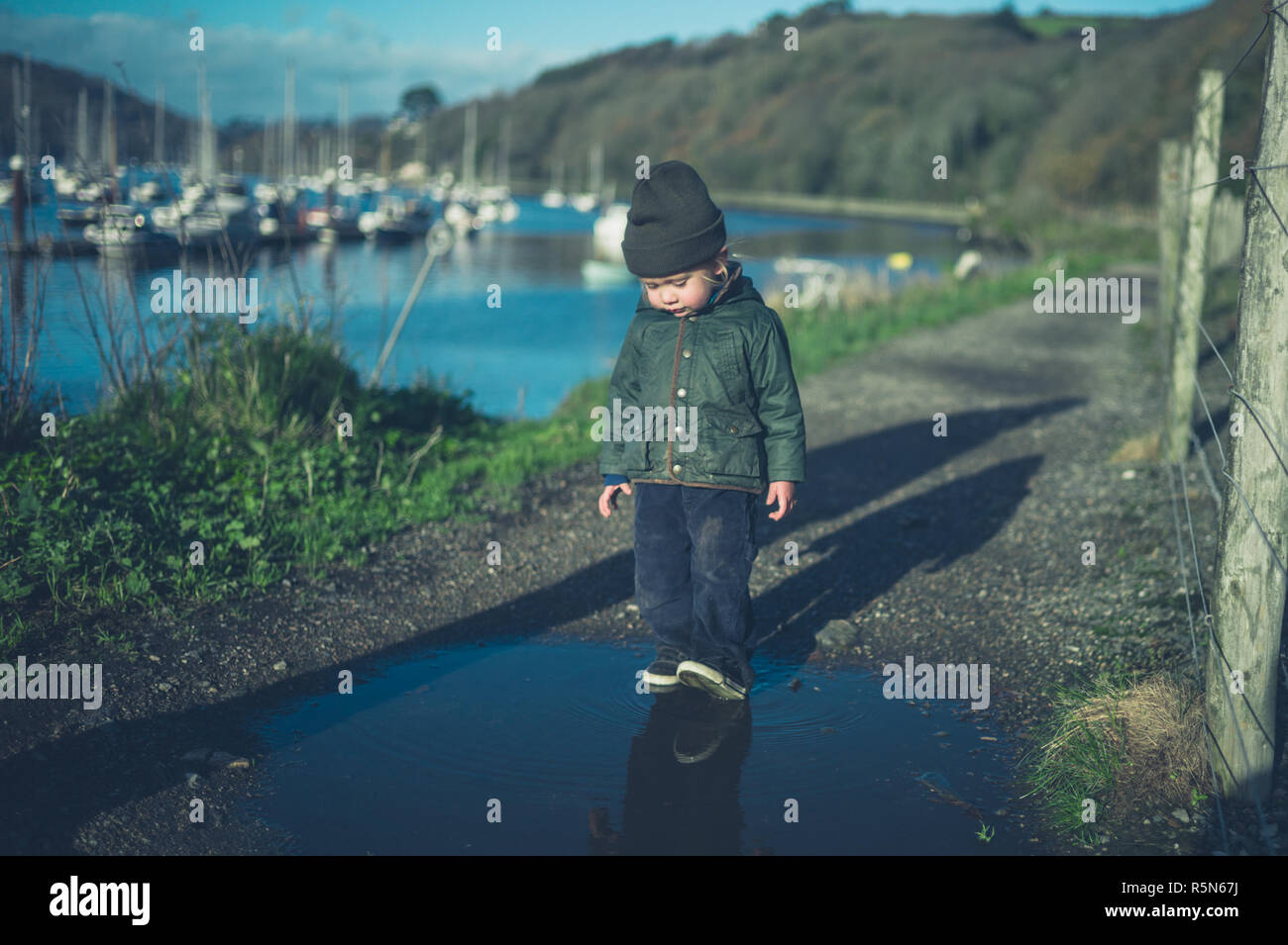Wet rain puddles water shoes hi-res stock photography and images - Alamy
