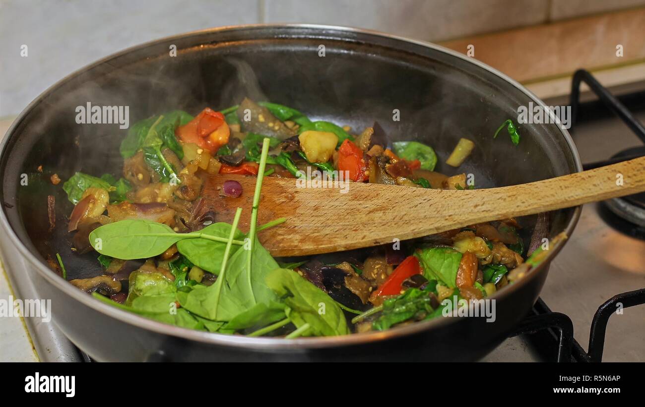 Preparing hot breakfast Stock Photo - Alamy