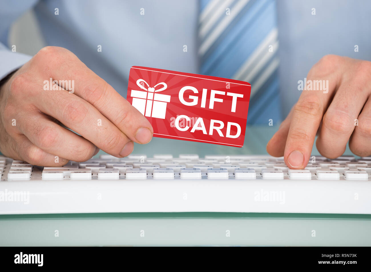 Employee giving key card hi-res stock photography and images - Alamy