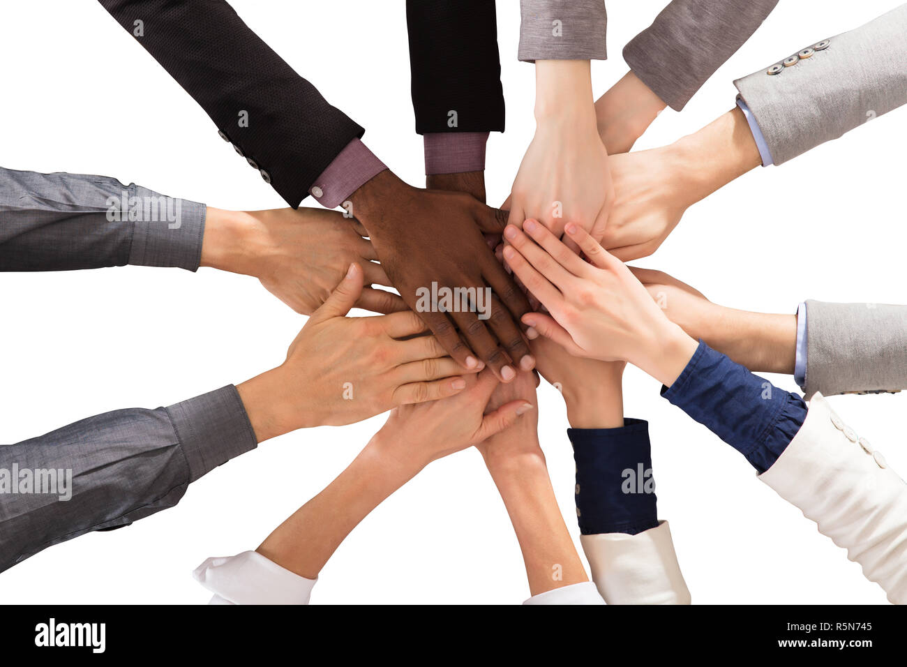 Multi Ethnic Business People Stacking Hands Stock Photo - Alamy