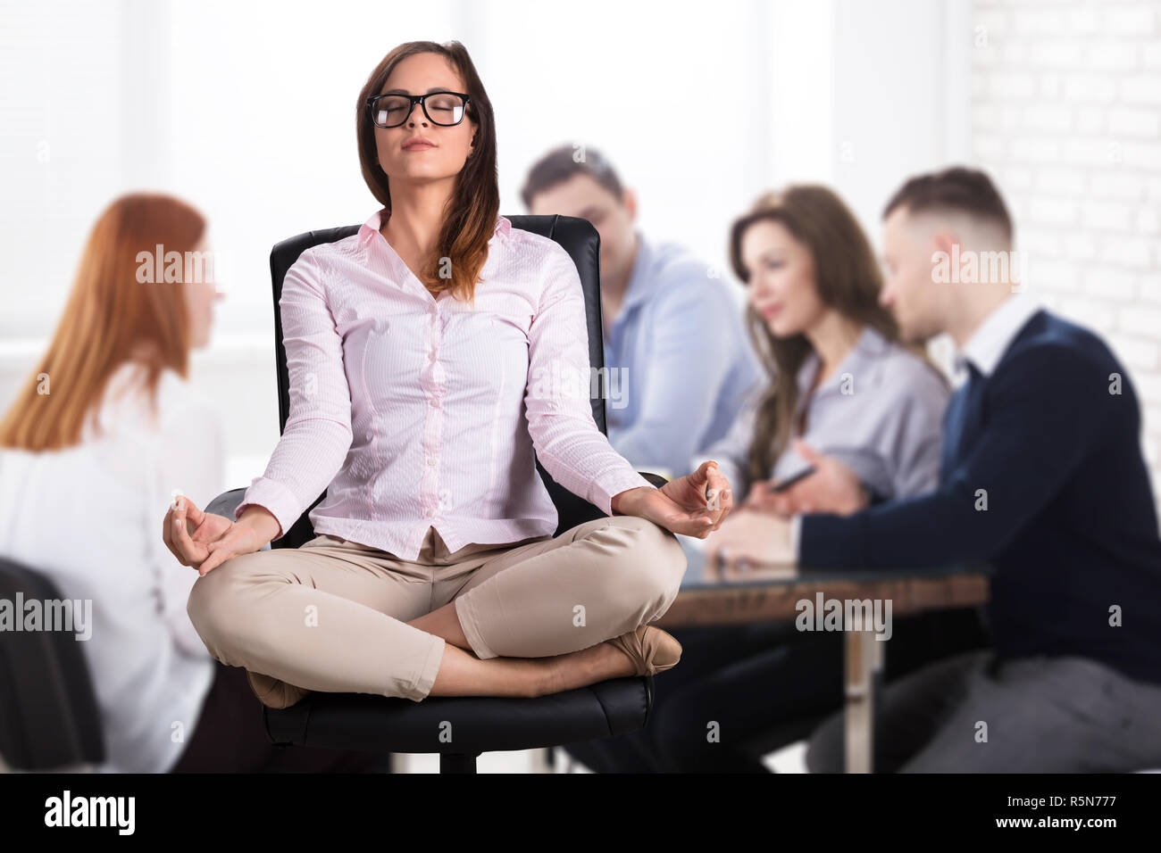 Office workers meditation hi-res stock photography and images - Alamy